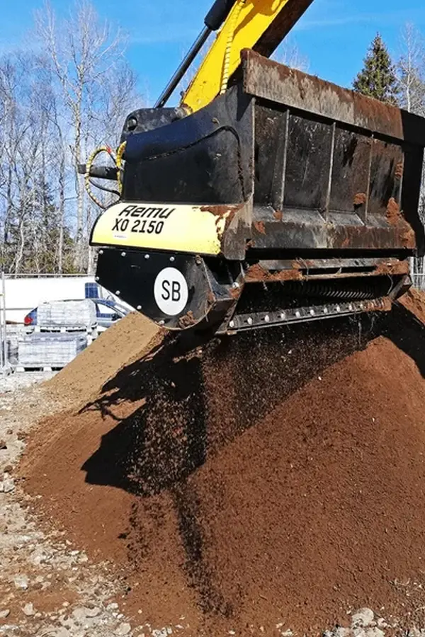 REMU XO2150 used for padding a trench in mountains - Remu